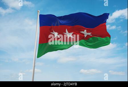 flag of Austroasiatic peoples Degar Montagnard at cloudy sky background ...