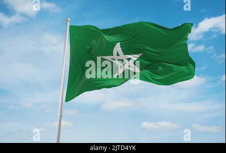 flag of Austroasiatic peoples Muong people at cloudy sky background ...