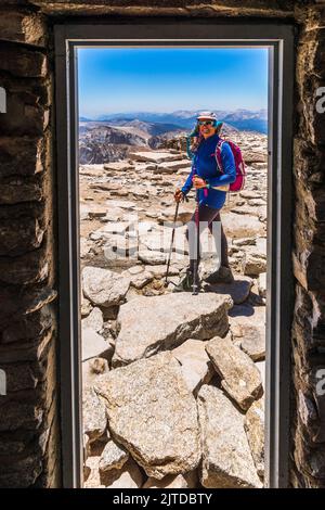 Hiker from inside the summit hut on Mount Whitney, Sequoia National ...