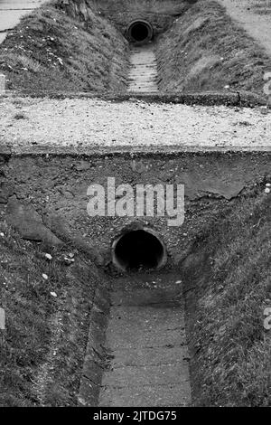 Concrete drainage ditch Stock Photo - Alamy