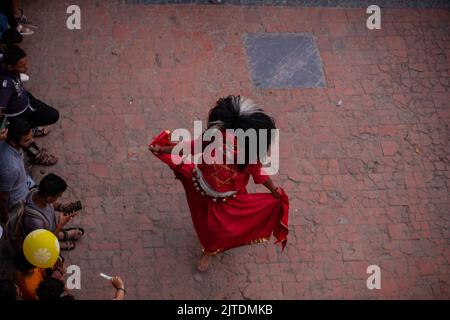 Devotees are pictured as they circumambulate Bagh Bhairab temple on the ...