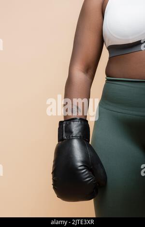 cropped view of african american plus size engineer drawing blueprint ...