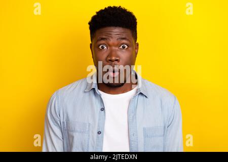 Photo of attractive impressed man wear casual t-shirt reading modern ...