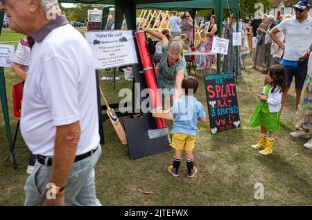 Children Playing The Traditional Game Of Splat The Rat At The Medieval ...
