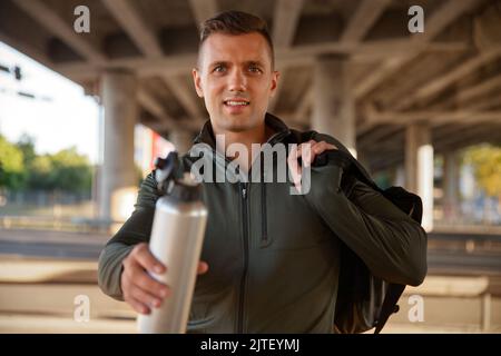 sportsman with bag outdoors Stock Photo - Alamy