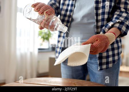 woman degreasing old table surface with solvent Stock Photo - Alamy