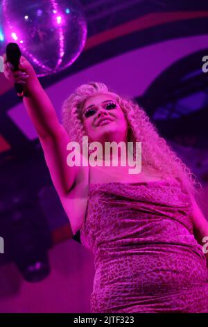 Kitty Scott-Claus is a British drag performer most known for competing ...