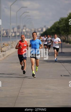 ISTANBUL, TURKIYE - JUNE 18, 2022: People running in colors during ...