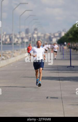 Istanbul, Turkey - June 18 2022: Corn seller on the street wearing a ...