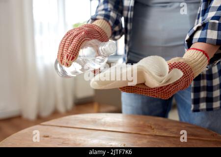 woman degreasing old table surface with solvent Stock Photo - Alamy