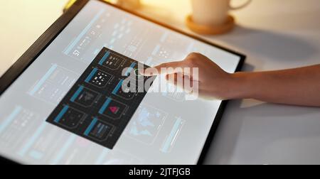hand on led light tablet at night office Stock Photo - Alamy