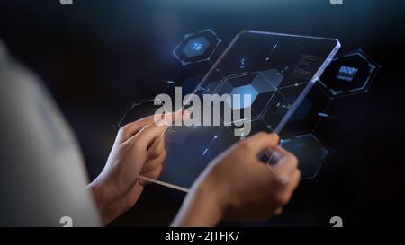 hands with transparent tablet pc and hologram Stock Photo - Alamy
