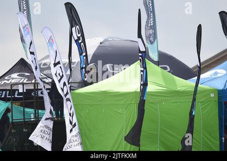 Korev and gopro Flags and tents at Surfing event Stock Photo - Alamy