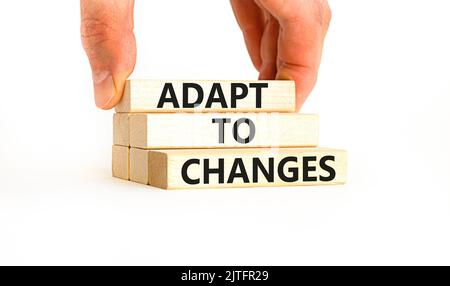 Adapt to changes symbol. Concept words Adapt to changes on wooden ...