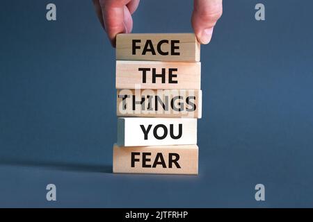 Face the things you fear symbol. Concept words Face the things you fear ...