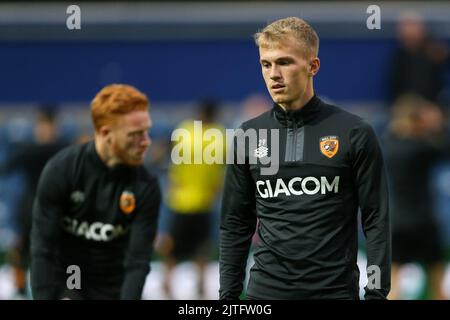 Matty Jacob #29 of Hull City and Jendo Fuchs #7 of Peterborough United ...