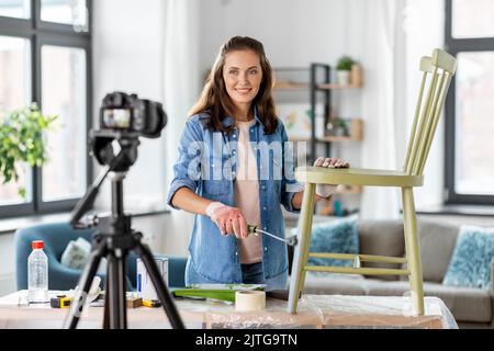 woman or blogger showing old chair renovation Stock Photo - Alamy