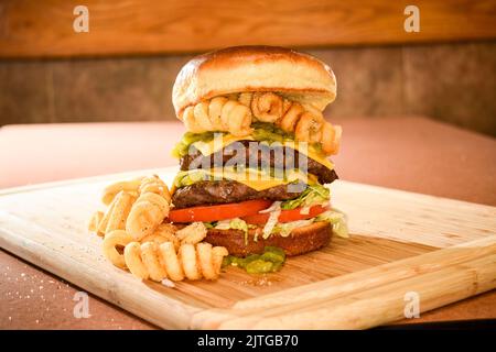 Twister's green chile double cheeseburger Stock Photo - Alamy