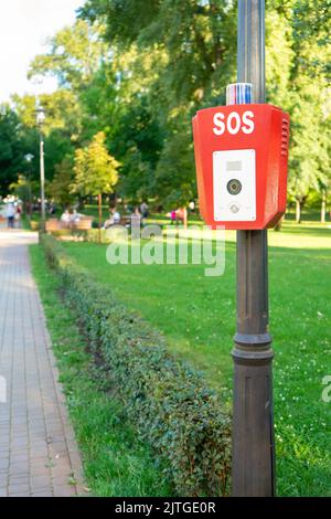 SOS, police, emergency button in the public park Stock Photo - Alamy