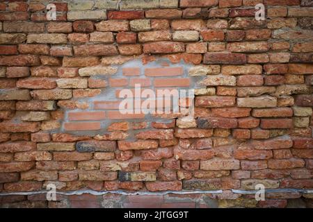 A wall that mixed with old and new materials Stock Photo - Alamy