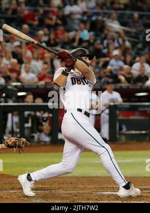 Philadelphia Phillies left fielder Cal Stevenson, right, signs young ...
