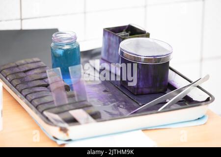 Hematoxylin and eosin solution. Blue solutions in a biochemical ...