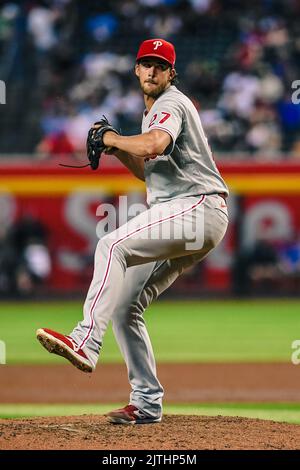 Philadelphia Phillies pitcher Aaron Nola throws against the Arizona ...