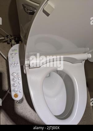 Controls of a Japanese toilet which washes, heats and dries your bottom ...