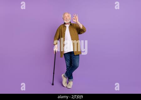 Full size photo of cheery young man shopaholic show black friday ...