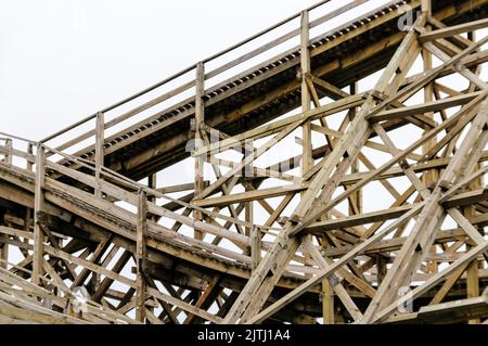 Old fashioned wooden roller coaster Stock Photo - Alamy