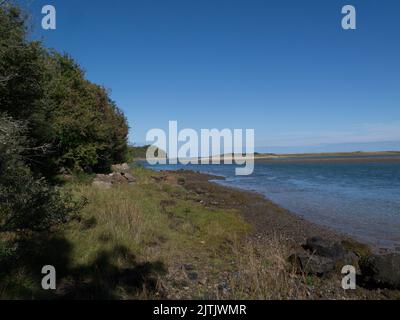 View of the estuary at Dulas, Anglesey, North Wales. A ship wreck ...