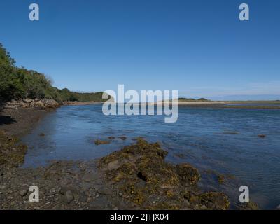 View of the estuary at Dulas, Anglesey, North Wales. A ship wreck ...