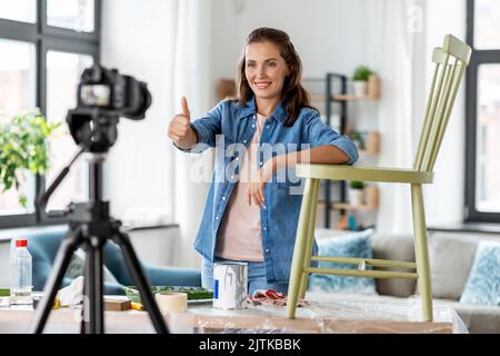 woman or blogger showing old chair renovation Stock Photo - Alamy