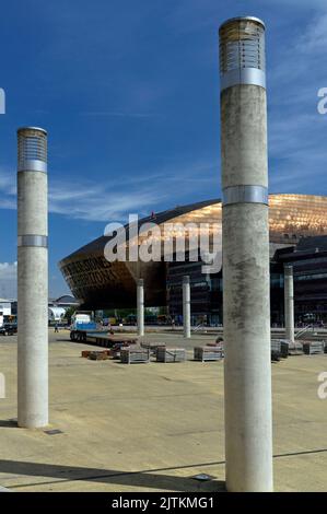 Men at work cleaning the copper roof of Cardiff Millennium Centre ...