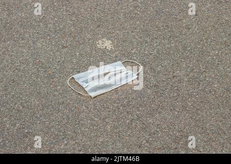 blue disposable protective mask, used for protection against cornavirus ...