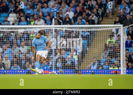Ruben Dias of Manchester City plays a pass under pressure during the ...