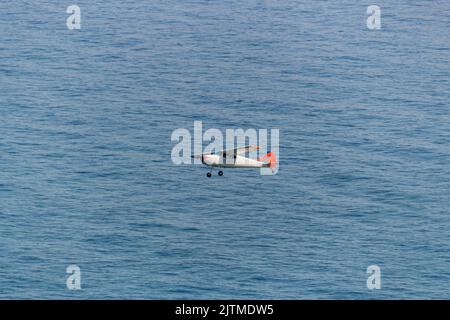 small plane flying over copacabana beach in Rio de Janeiro Brazil Stock ...