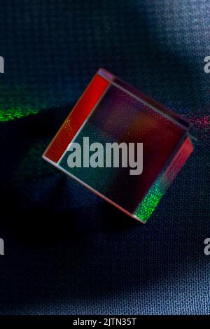 Luminous prism cubes refract light in different colors Stock Photo - Alamy