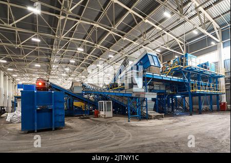 Large production line with conveyors carrying trash at plant Stock Photo - Alamy
