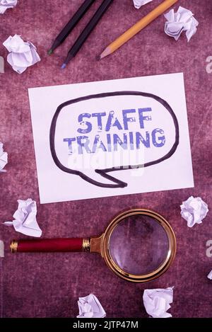 Handwriting text Staff TrainingA program that helps employees to learn ...