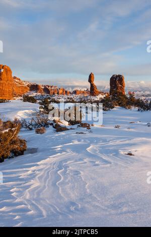 Balanced Rock after a winter snowfall in Arches National Park, Moab ...