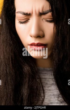 Upset millennial pretty brunette female in towel presses her hands to ...