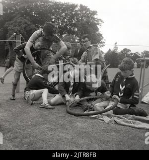 1965, historical, scout rally, sitting on the ground outside in ...