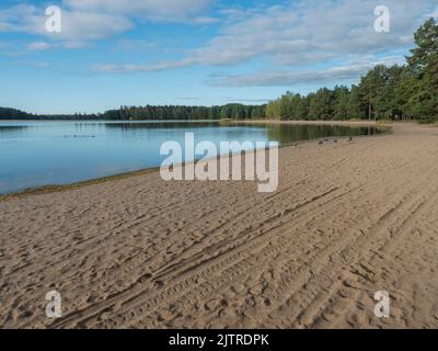 Sand beach at Strandstuvikens camping near Nykoping, Sweden with ...