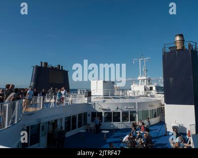 Rodbyhavn, Denmark, Agust 21, 2021: People enjoying the cruise and sun ...