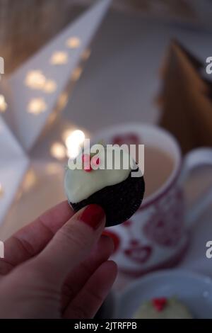 Chcocolate biscuits dipped in white chocolate and topped with candy ...