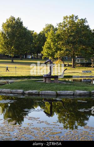 Dragon Statue in the Middle of Reflective Waters at Sar Ko Par Park in ...