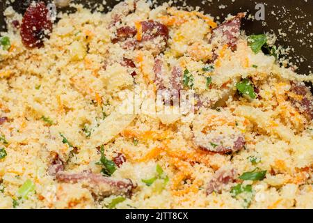 bacon crumbs with dried meat, a very popular food in Brazil Stock Photo ...
