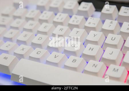 white gamer keyboard with colorful lights in rio de janeiro brazil ...