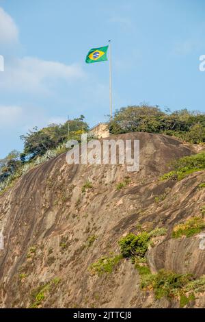 Brazil flag on top of the rudder stone in Rio de Janeiro Brazil Stock ...